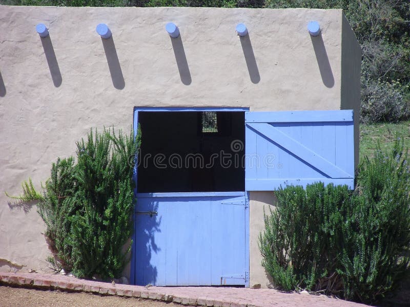 Horse Stable with Blue Door Stock Photo - Image of poles, open: 51761020