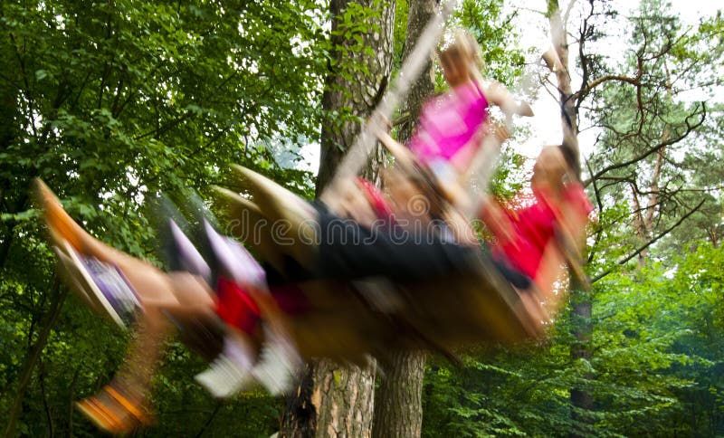 Horseback forest swing. stock image. Image of expression - 18875811
