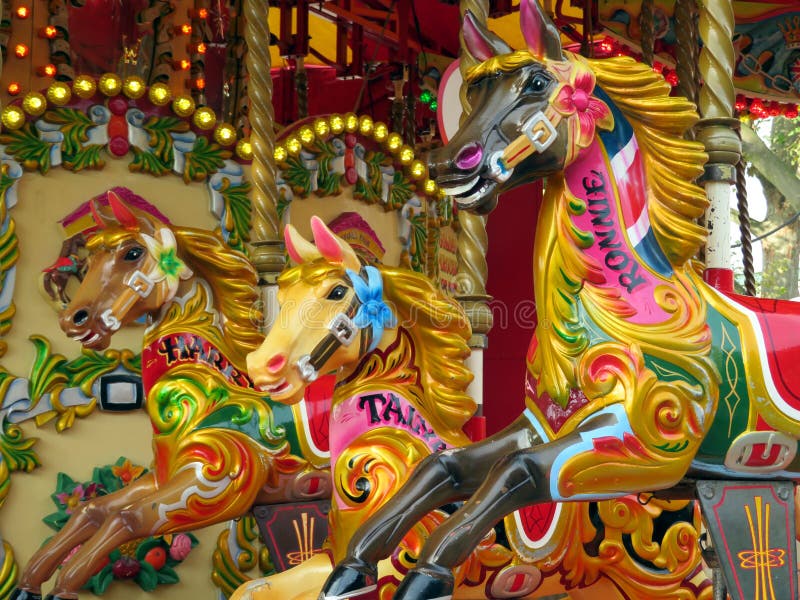 Horses on a carousel stock image. Image of whirlygig - 80741349