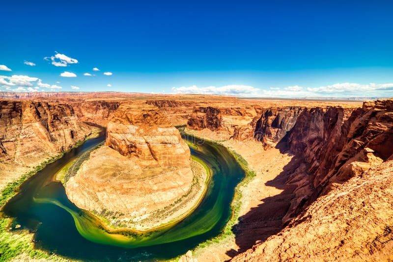 Horseshoe Bend on Colorado River with Bright Blue Sky, Utah Stock Image ...