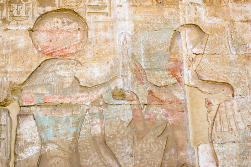 Isis and Osiris carving stock photo. Image of painting - 13312116
