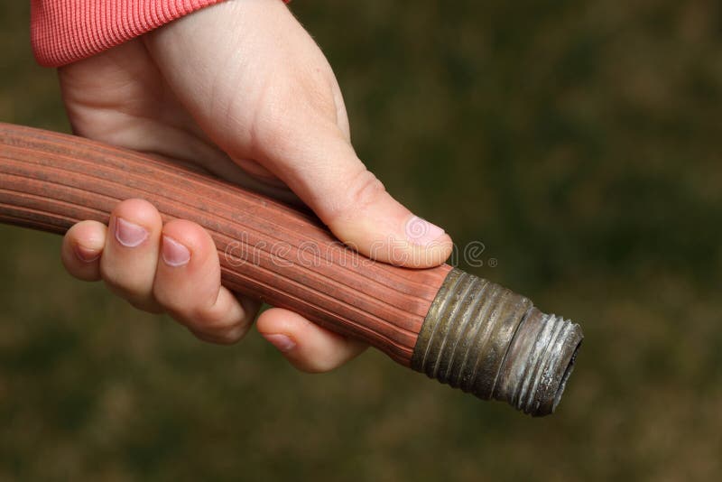 Hose stock photo. Image of rubber, hose, finger, holding - 12979580