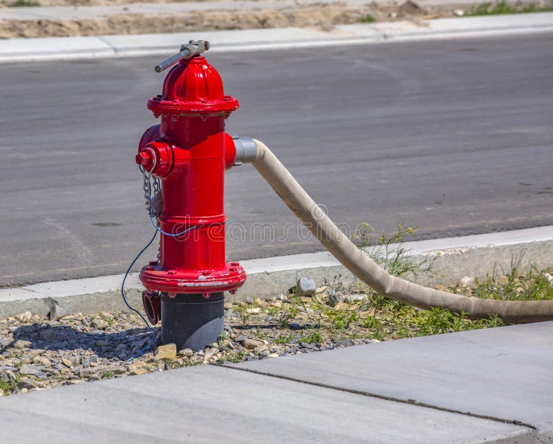Fire Hose and Wrench Connected To Hydrant Stock Photo - Image of faucet ...
