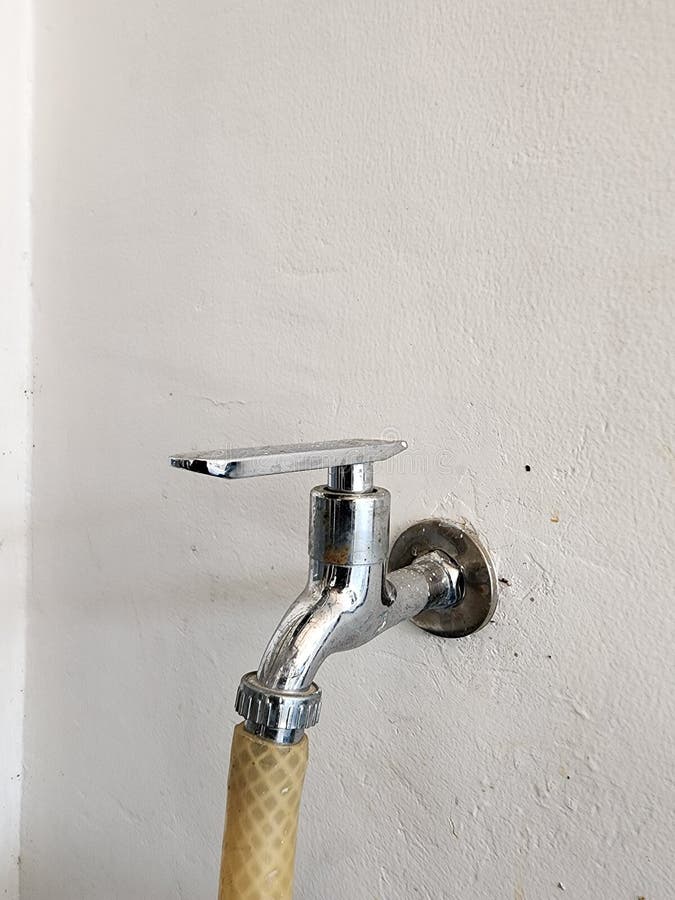 Hose Connection To a Water Tap Stock Photo - Image of bottle, wall ...