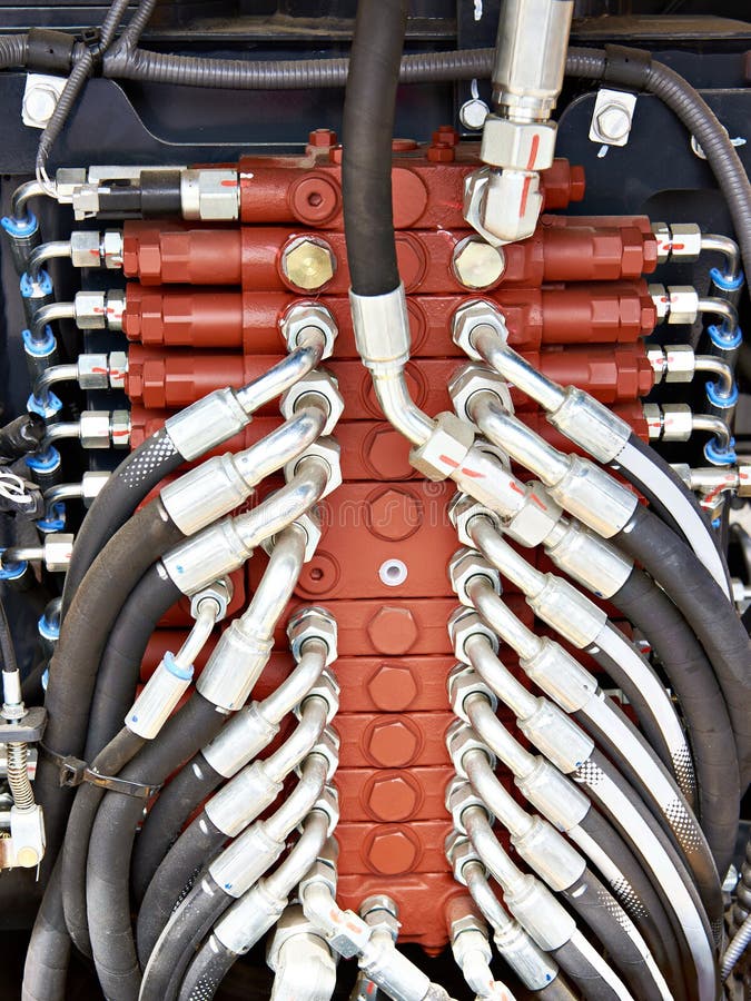 Hoses of hydraulic machine stock photo. Image of power - 255597644