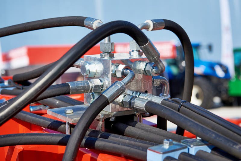 Hoses of hydraulic machine stock image. Image of fittings - 374741869