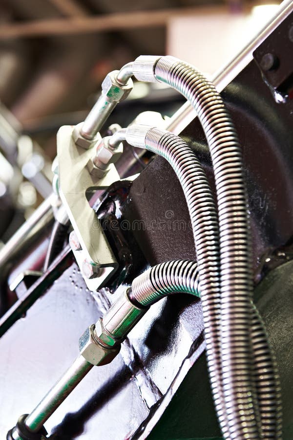 Hoses of hydraulic machine stock image. Image of tool - 274393735