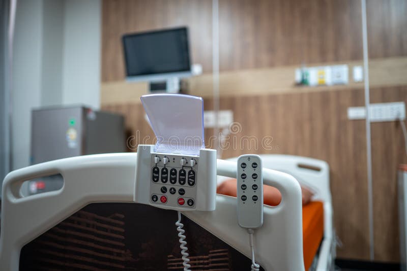 A Hospital Bed with a Remote Control on it Stock Image - Image of ...