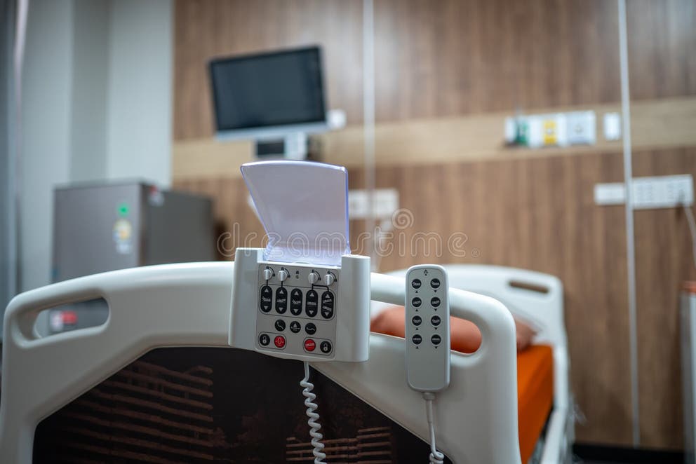 A Hospital Bed with a Remote Control on it Stock Image - Image of ...