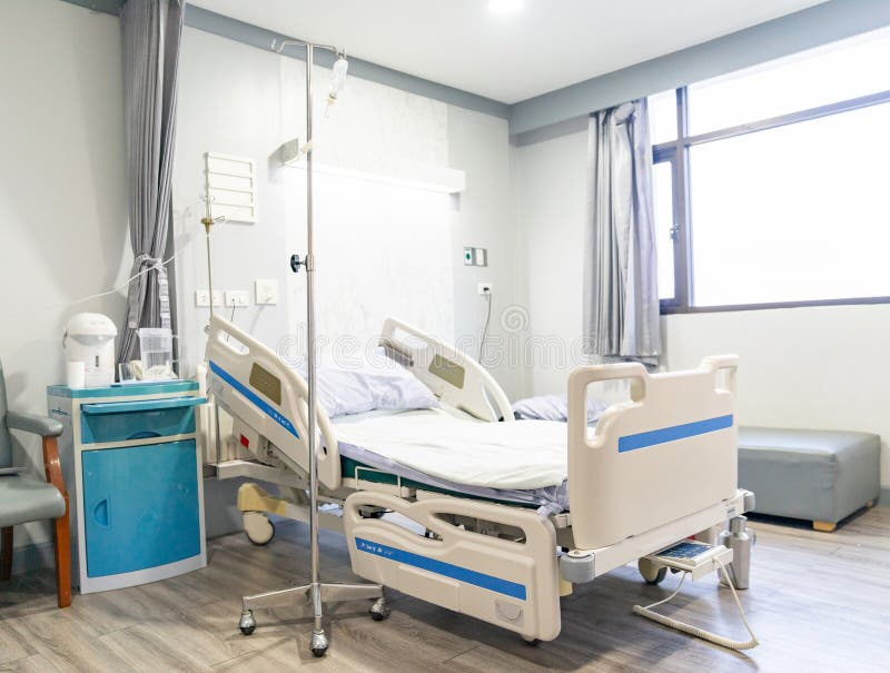 Hospital Bed Remote Control Hanging on the Bed Rail. Technology ...