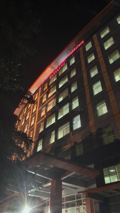 Hospital building at night editorial stock image. Image of doctor ...