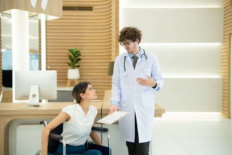Hospital Doctor Explaining the Results of the Treatment and the ... Hospital Doctor Explaining the Results of the Treatment and the ...