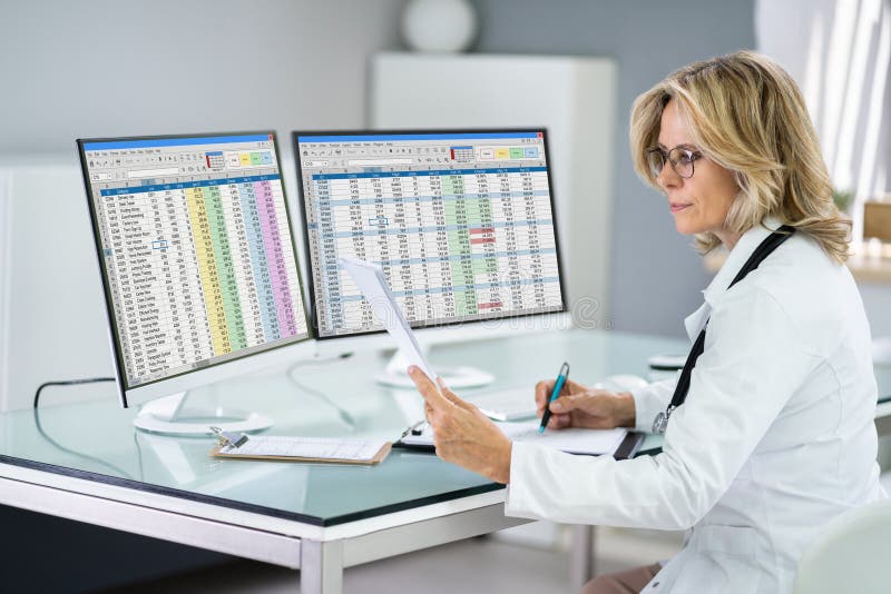 Hospital Doctor Using Spreadsheet for Billing Codes Stock Image - Image ...