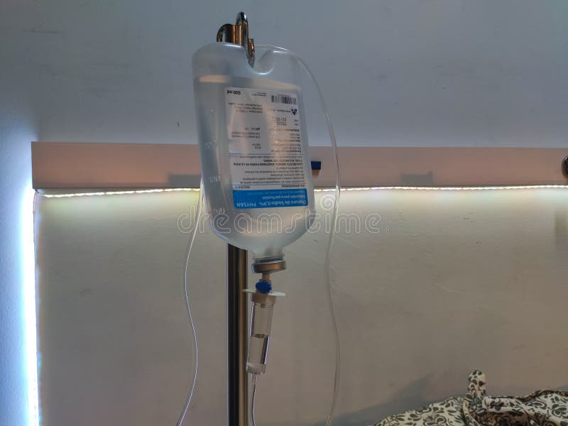 Hospital Dropper with Saline Solution. White Background with a Led ...