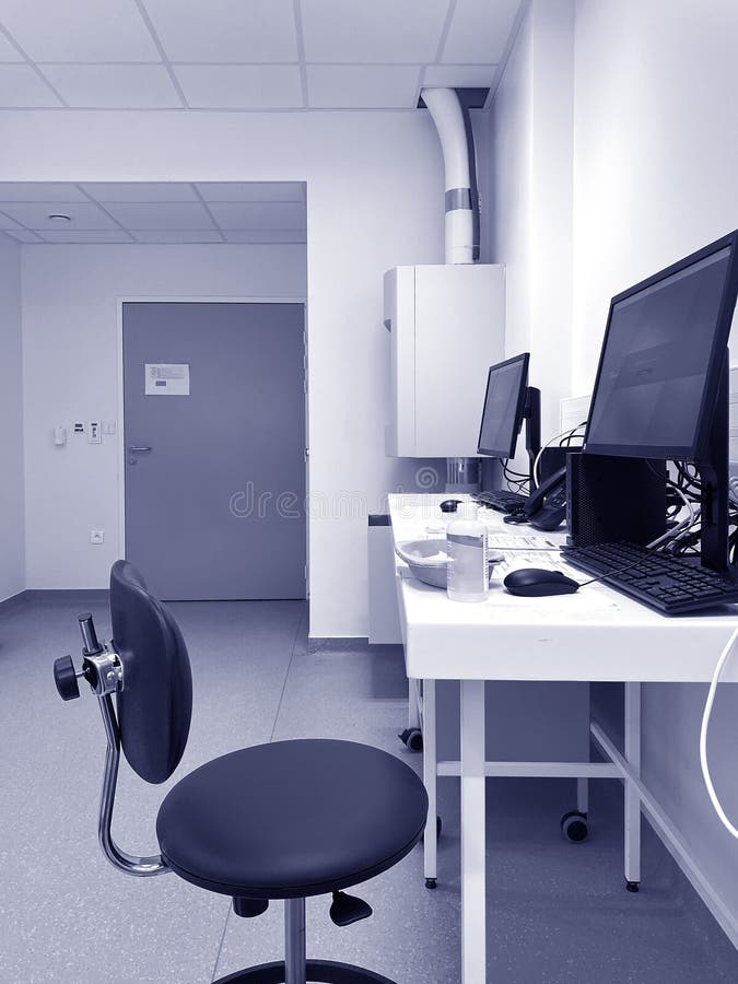 Hospital Facility Room with Computers and Clean Yellow Floor Stock ...