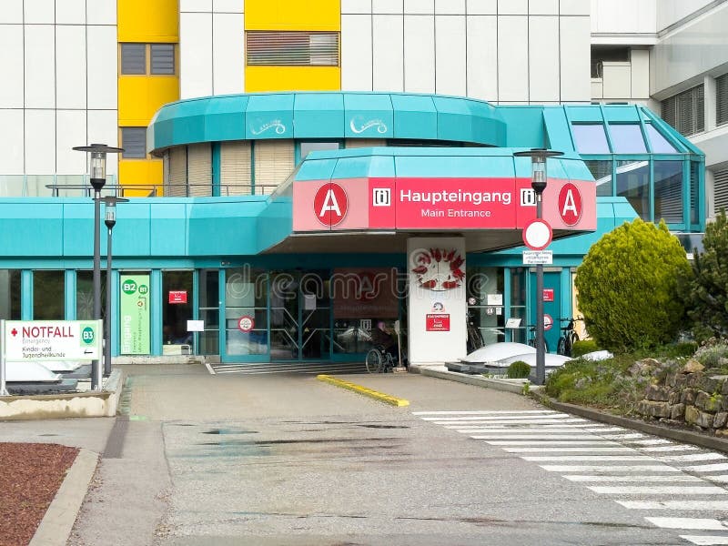 Hospital Main Entrance with Signage and Pathway in Urban Setting ...