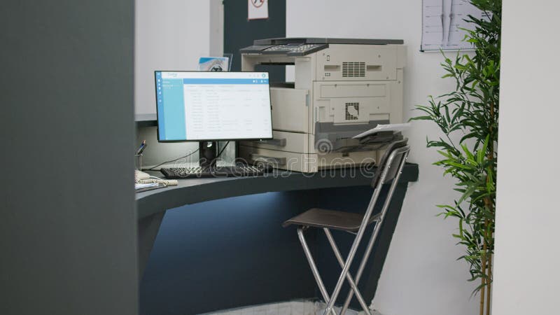 Hospital Registration Desk with Appointment Forms on Computer Stock ...