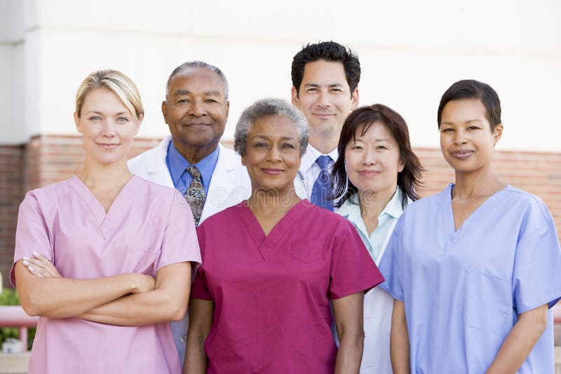 Hospital Staff Standing Outside a Hospital Stock Image - Image of ...
