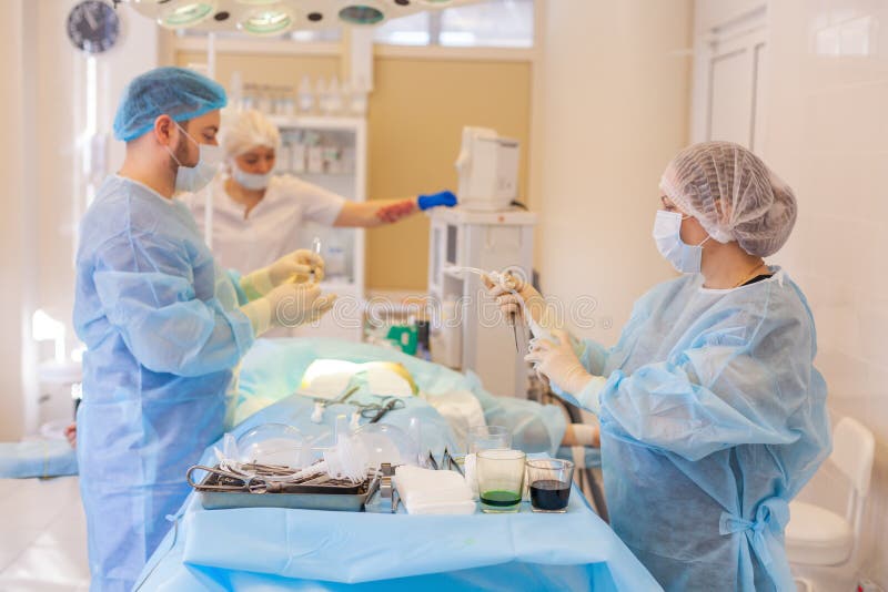 Hospital. Surgeon Operates in the Operating Room Stock Image - Image of ...