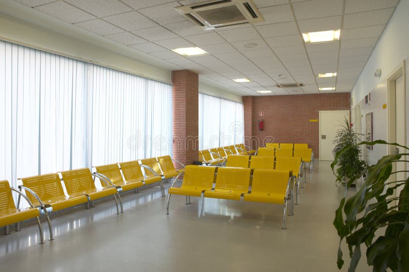 Hospital Waiting Area with Yellow Metallic Chairs. Stock Image - Image ...