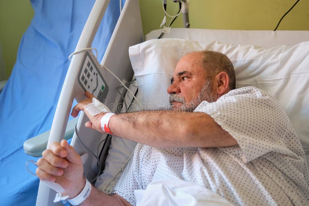 Senior Man Using Hospital Bed Control Panel during Recovery Stock Image ...