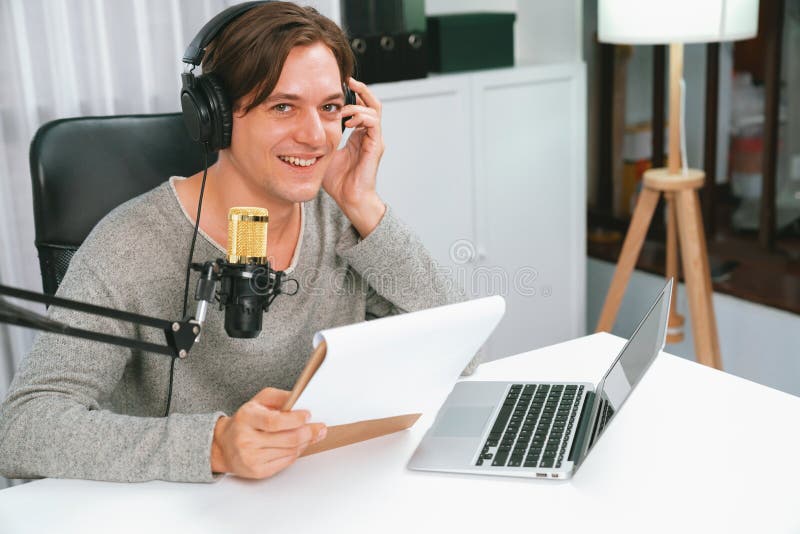 Host Channel in Broadcaster with Script Note Reading To Listeners ...