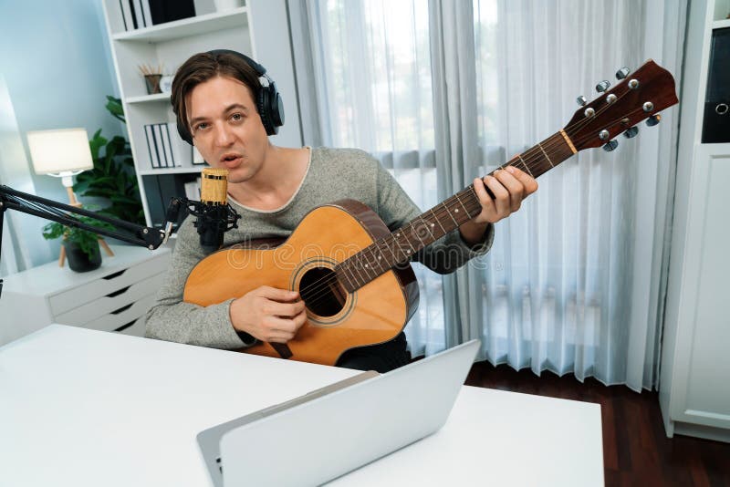 Host Channel Singer Looking Camera, Playing Guitar Along Singing ...