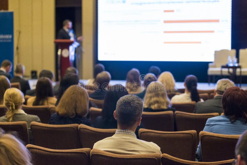 Host Speakers Talking in Front of the Audience during the Conference ...