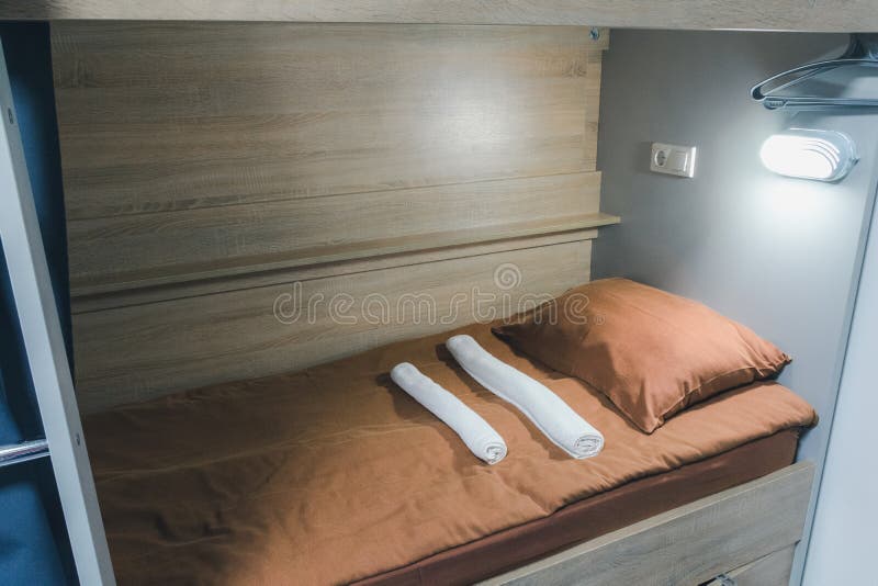 Hostel Bed with Brown Bed Sheets. Stock Image - Image of beds, hostel ...