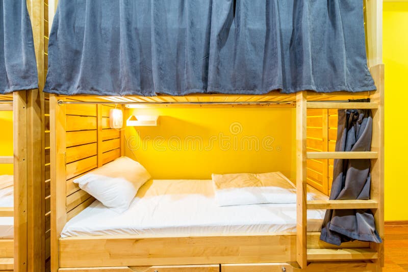 The Hostel Dormitory Beds Arranged in Room Stock Photo - Image of dorm ...