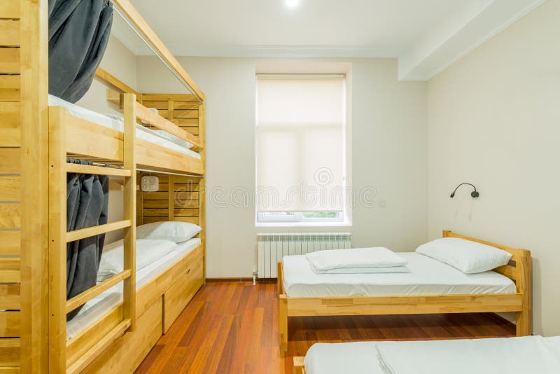The Hostel Dormitory Beds Arranged in Room Stock Photo - Image of ...
