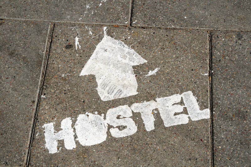 Hostel sign on the ground stock photo. Image of indicator - 11838838