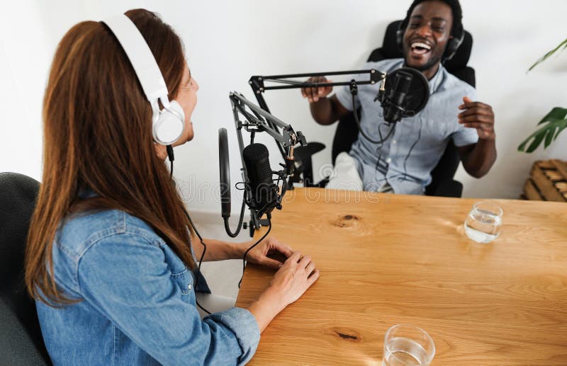 Hosts Having Podcast Session Together - Female Speaker Making an ...