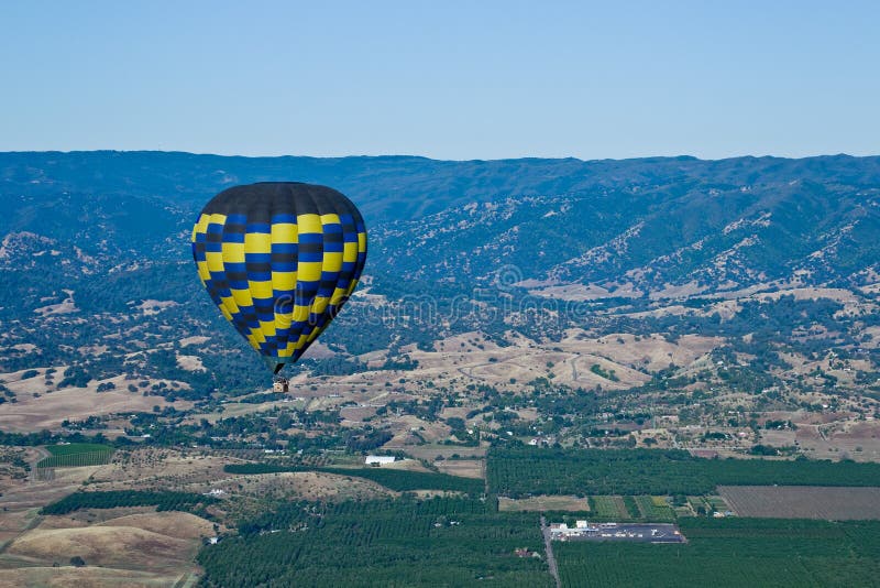 Hot Air Balloons Passing Over Mountains in Colorado Stock Photo - Image ...