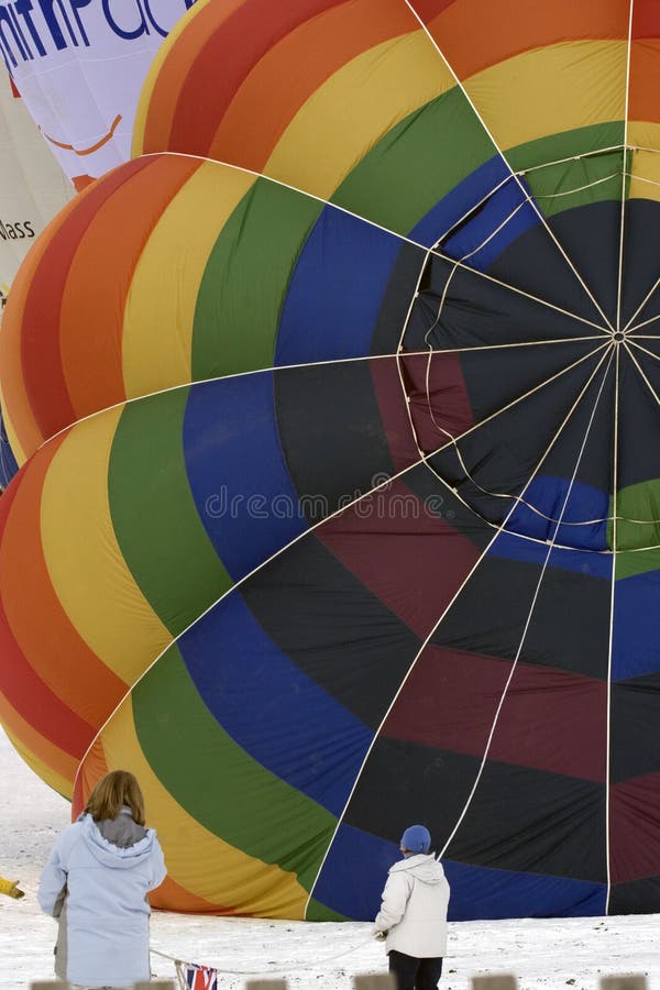 Hot Air Balloon Being Deflated on the Ground Stock Image - Image of ...
