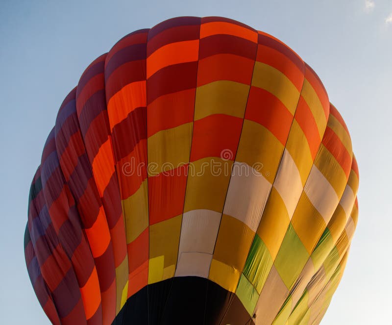 A Hot Air Balloon with a Colorful Pattern is Floating in the Sky Stock ...