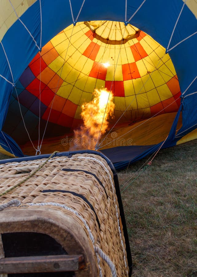 A Hot Air Balloon with a Fire in the Bottom of it Stock Image - Image ...