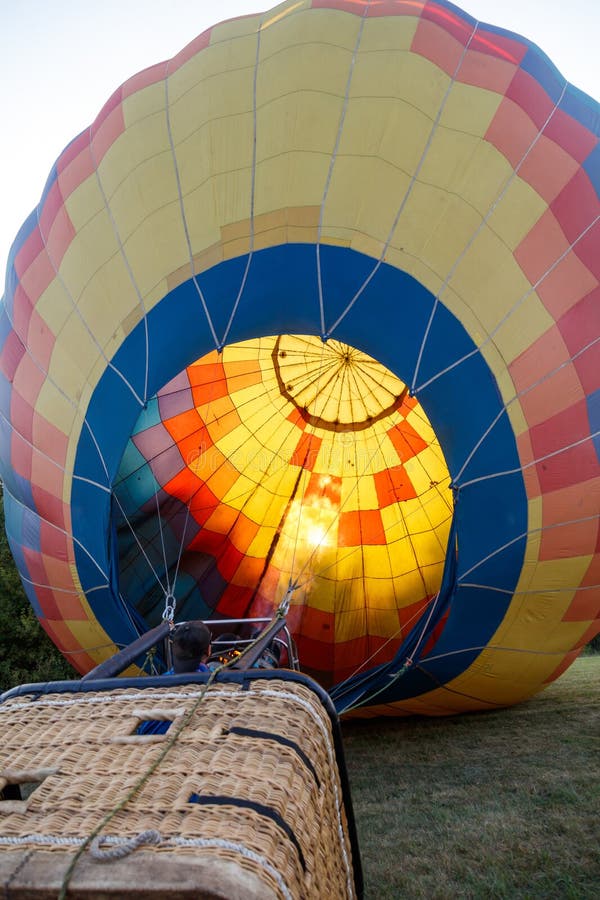 A Hot Air Balloon with a Fire in the Bottom of it Stock Image - Image ...