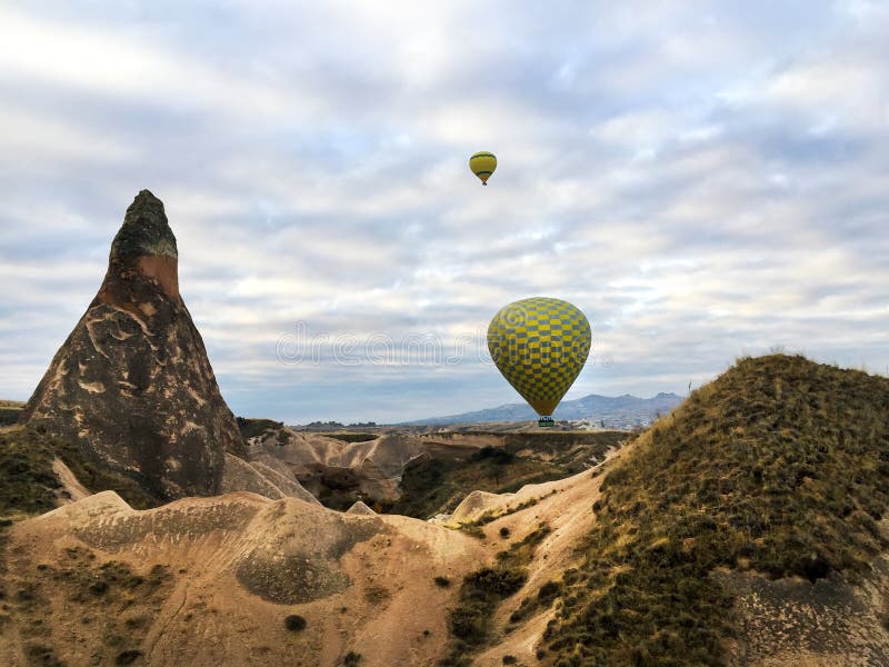 Hot Air Balloon Fly Over Cappadocia, Turkey Stock Photo - Image of cave ...