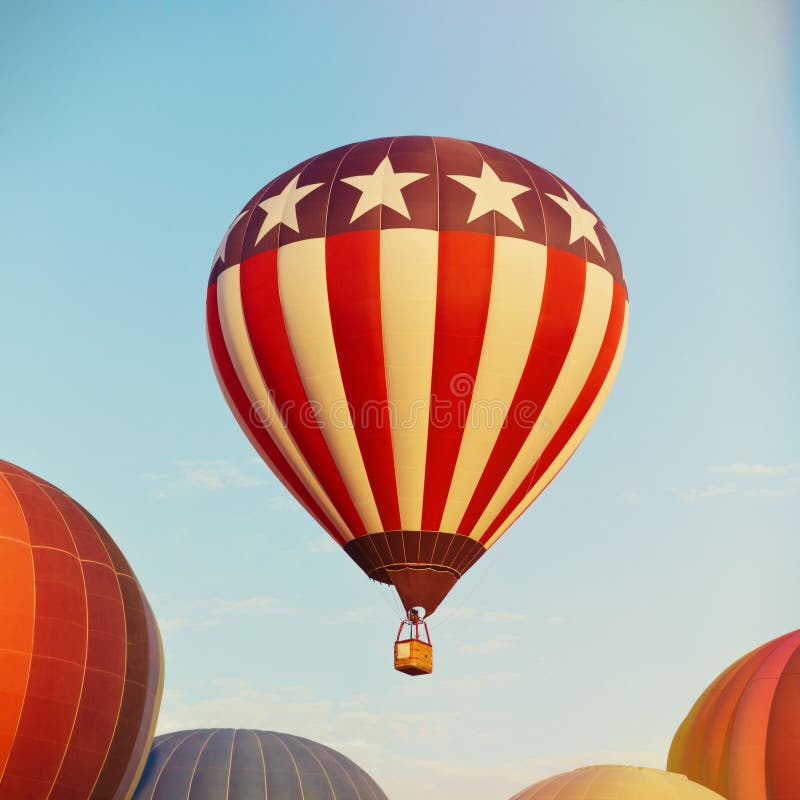 Hot Air Balloon Flying Over Blue Sky Stock Image - Image of recreation ...
