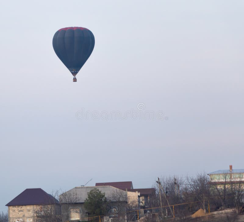 Hot Air Balloon Flying Over the Villas Stock Image - Image of sport ...