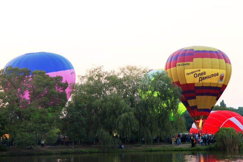 Hot Air Balloon Over Evening Summer Lake Editorial Photography - Image ...