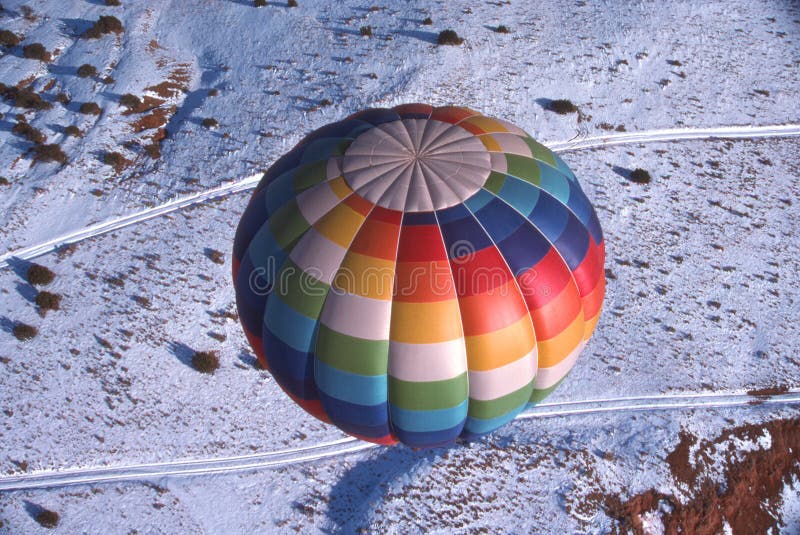 Hot Air Balloon Over Snow stock photo. Image of extreme - 12647494