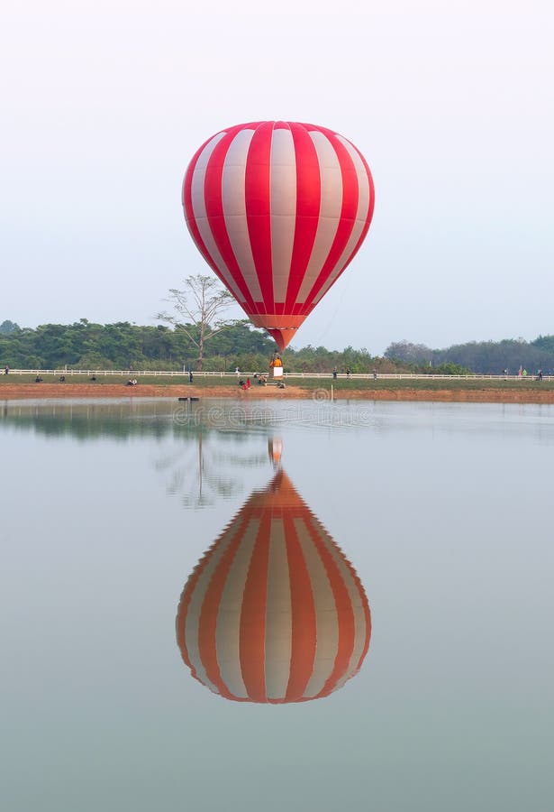 Hot Air Balloons Flight Over Lake. Stock Image - Image of morning ...