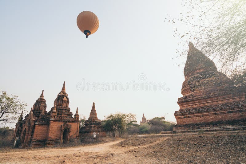 Hot Air Balloons Flying Over Pagodas at Bagan Temple Complex, Myanmar ...