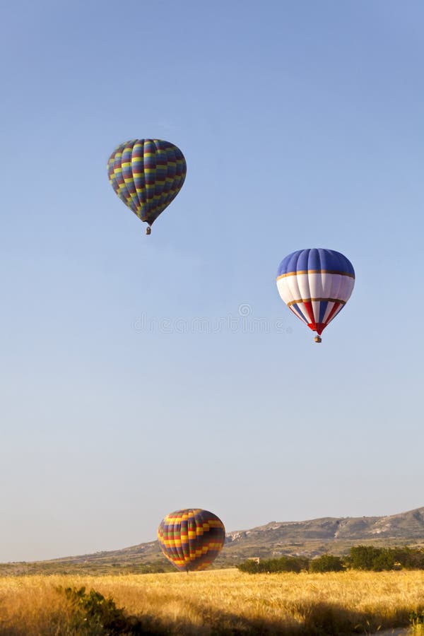Hot air balloons rising stock photo. Image of blue, geology - 25975032