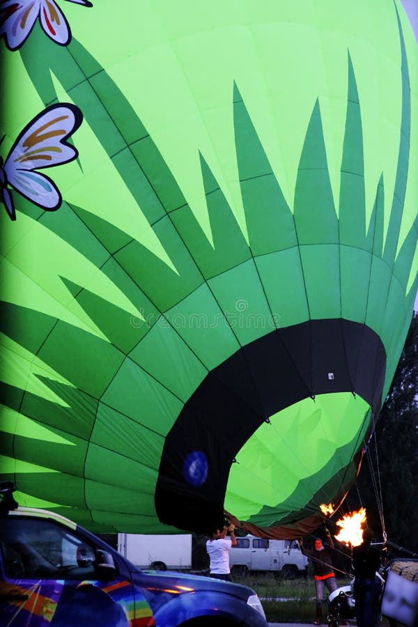 Hot Air Baloon Starting To Fly in the Evening Sky Editorial Photography ...