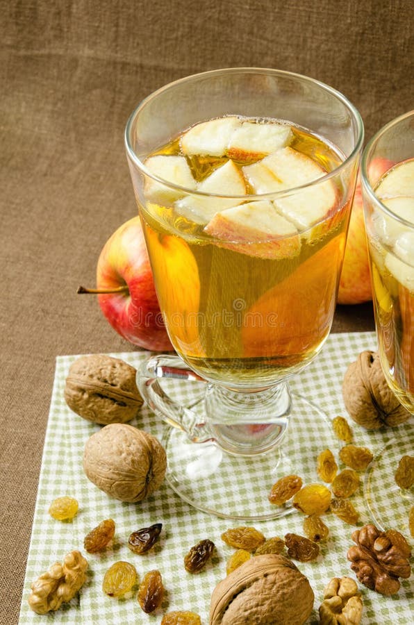 Hot Apple Cider with Apples and Slices in Cups Stock Photo - Image of ...