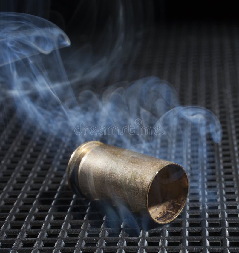 Hot brass stock image. Image of cartridge, casing, smoke - 68527609