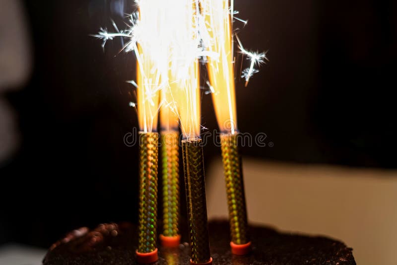 Hot Candles Fireworks are Inserted into the Cake Stock Photo - Image of ...